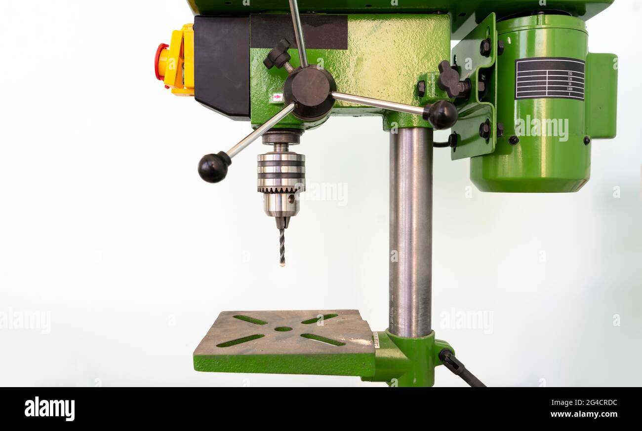 a steel bench drill machine in the factory isolated, working process ...