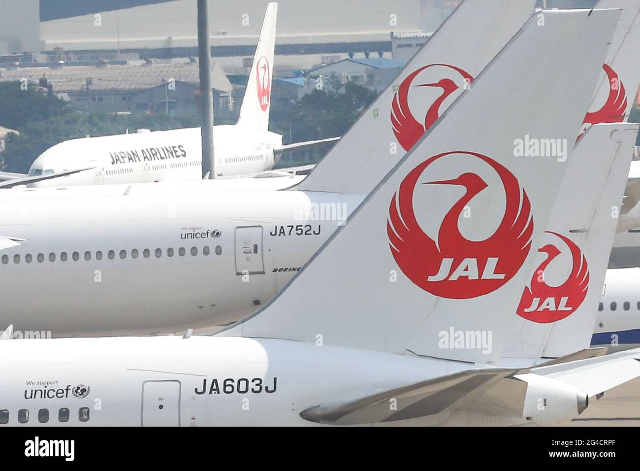 Japan Airlines' (JAL) aircrafts are seen at Tokyo International Airport ...
