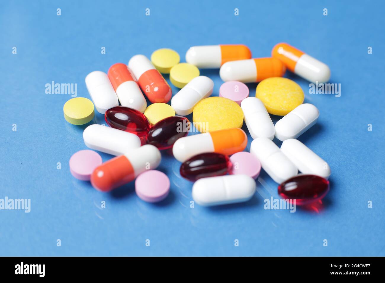 Colorful of tablets and capsules pill in blister packaging arranged ...