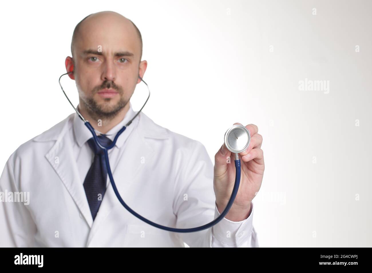 Doctor with stethoscope. Isolated on white background Stock Photo - Alamy