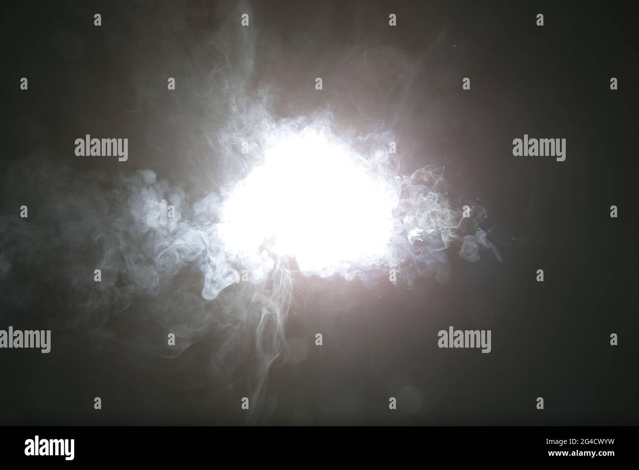 Artificial magic light illuminates smoke isolated on dark background ...