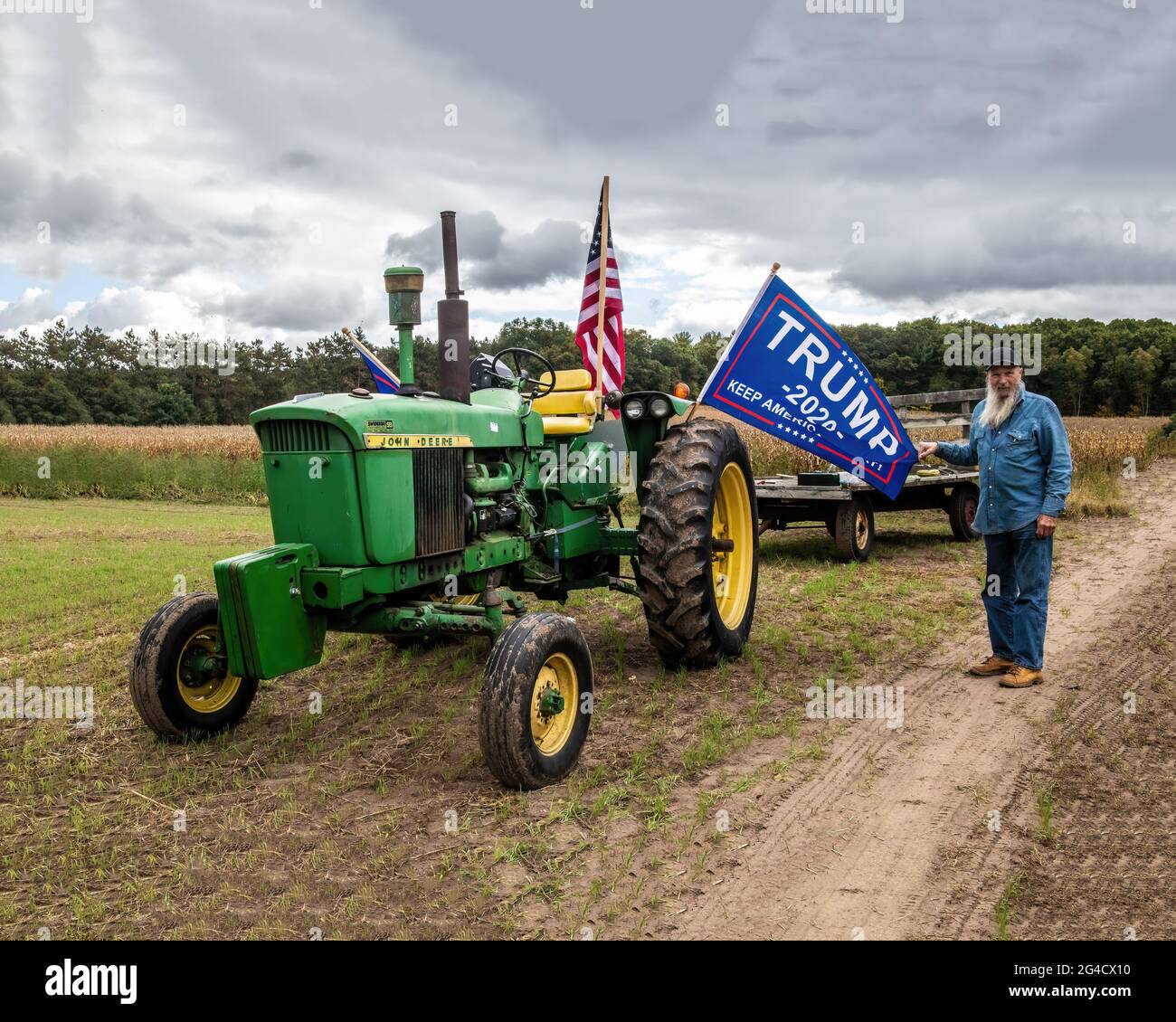 Farmer John with his John Deere 3020 Tractor holding out a Trump Banner ...