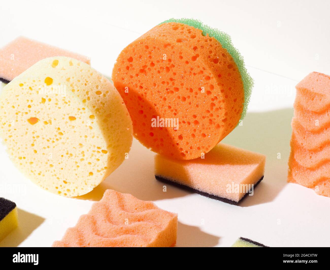 Foam rubber sponges in different shapes close up. Round and rectangular ...
