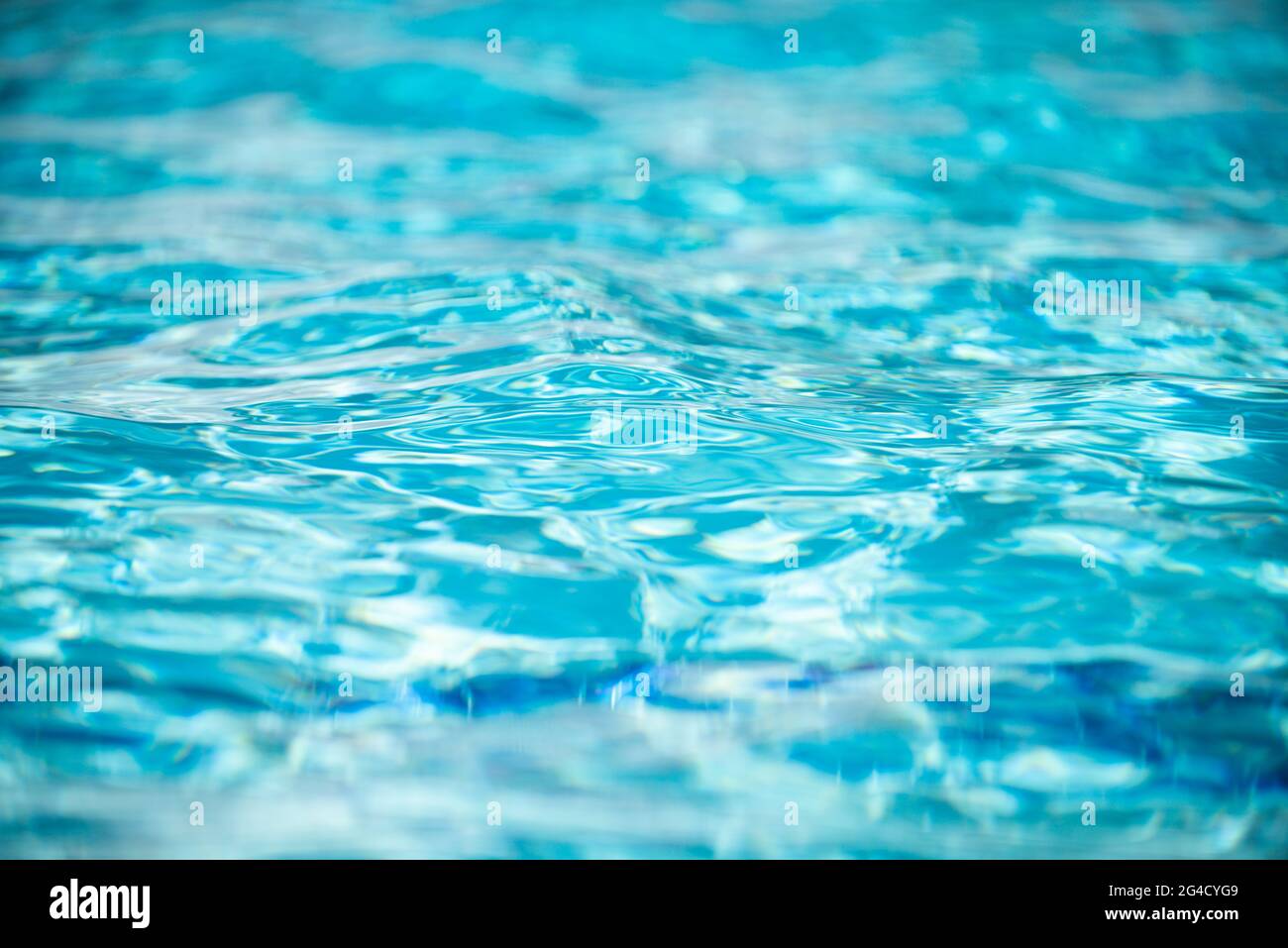 Abstract ripple wave and clear turquoise water surface in swimming pool ...