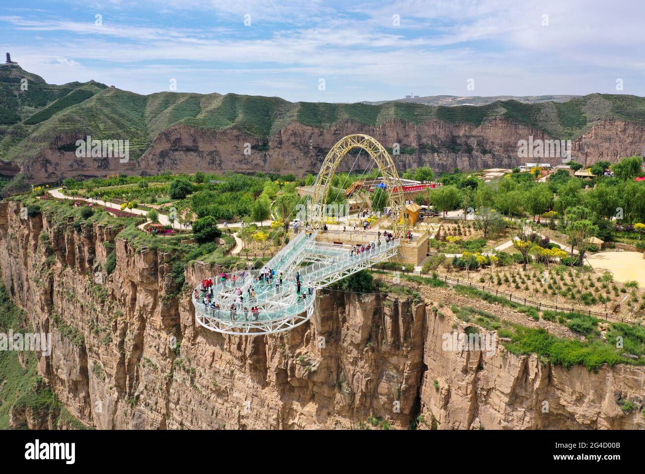ORDOS, CHINA - JUNE 20, 2021 - Tourists go sightseeing on the suspended ...