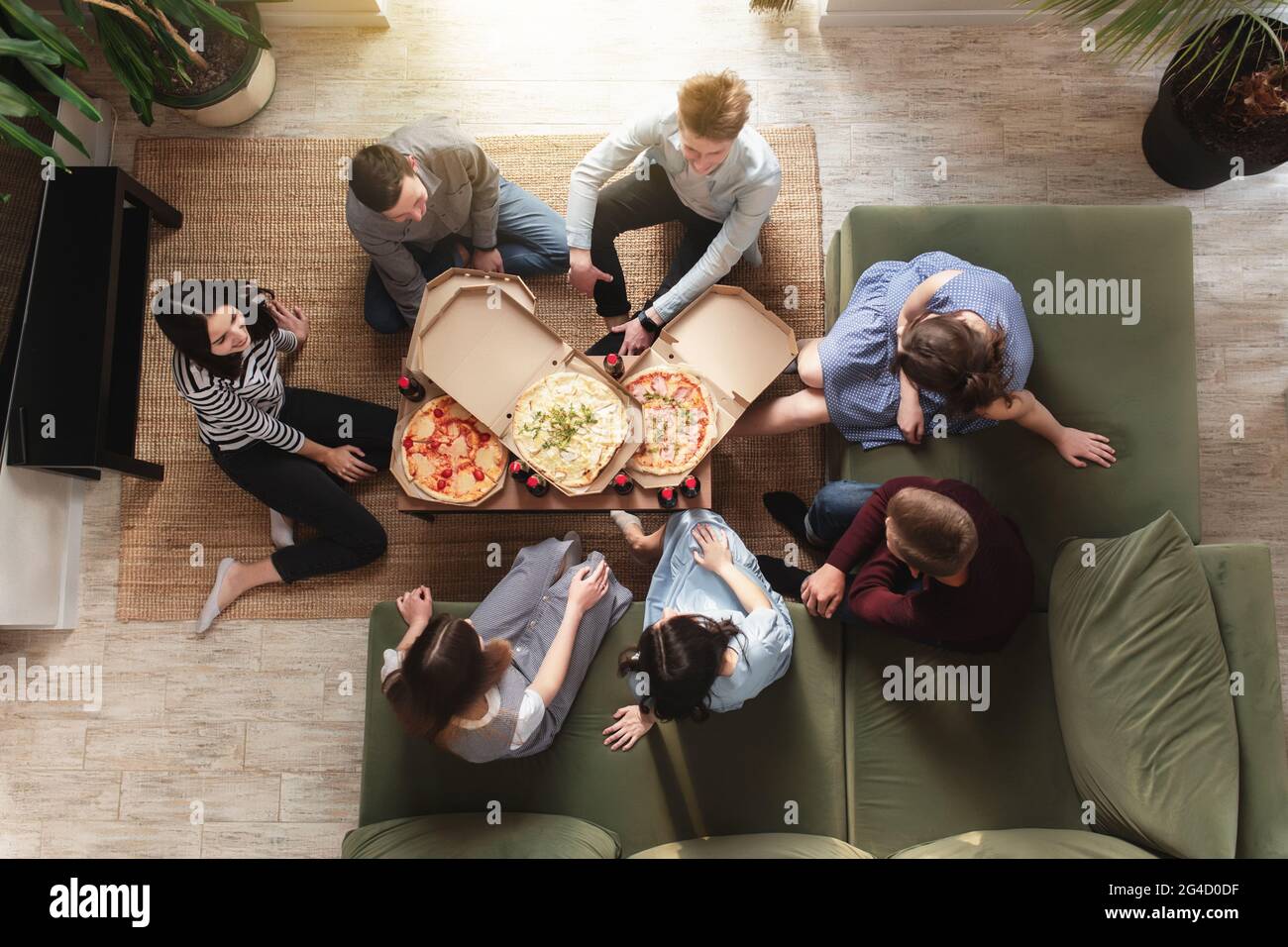 Pizza party, group of friends chatting, eating pizza, drinking sweet ...
