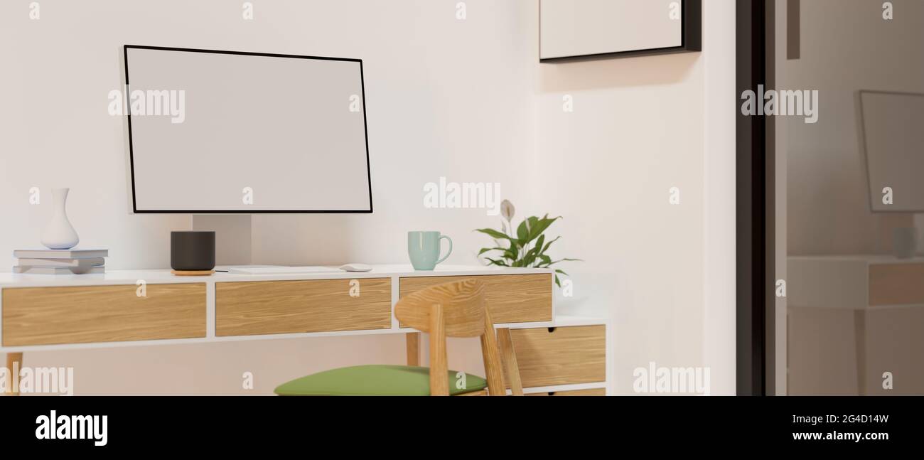 Computer monitor with mock-up screen on the desk beside the door office ...