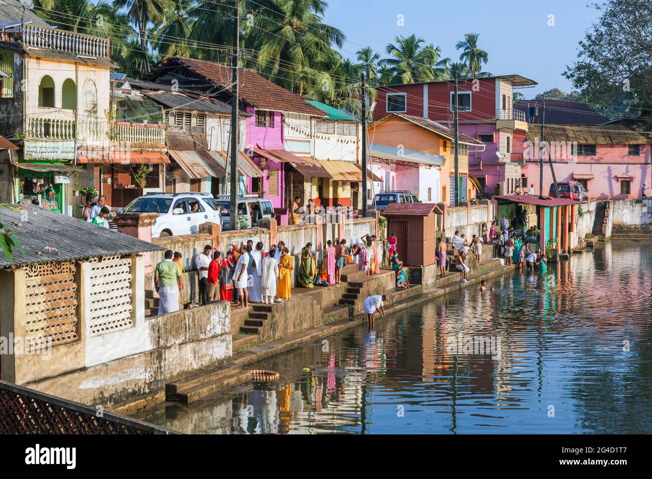 Indian worshippers performing a ceremony at the spiritual, holy sacred ...