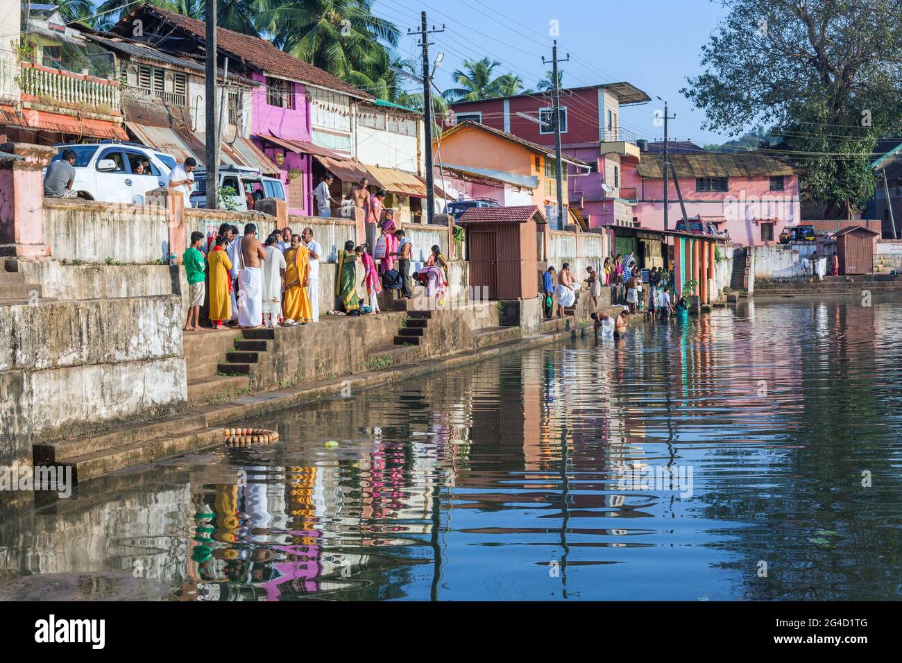Indian worshippers performing a ceremony at the spiritual, holy sacred ...