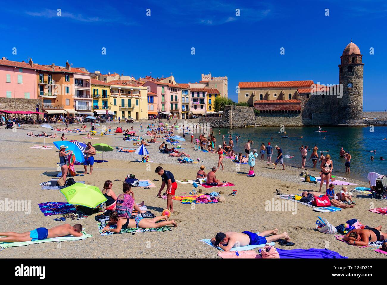 People having fun on the beach in summer in Collioure, France Stock ...