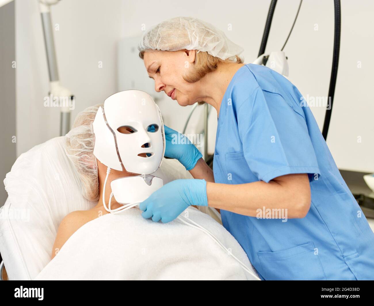 Conducting facial rejuvenation medical procedure using a mask with ...