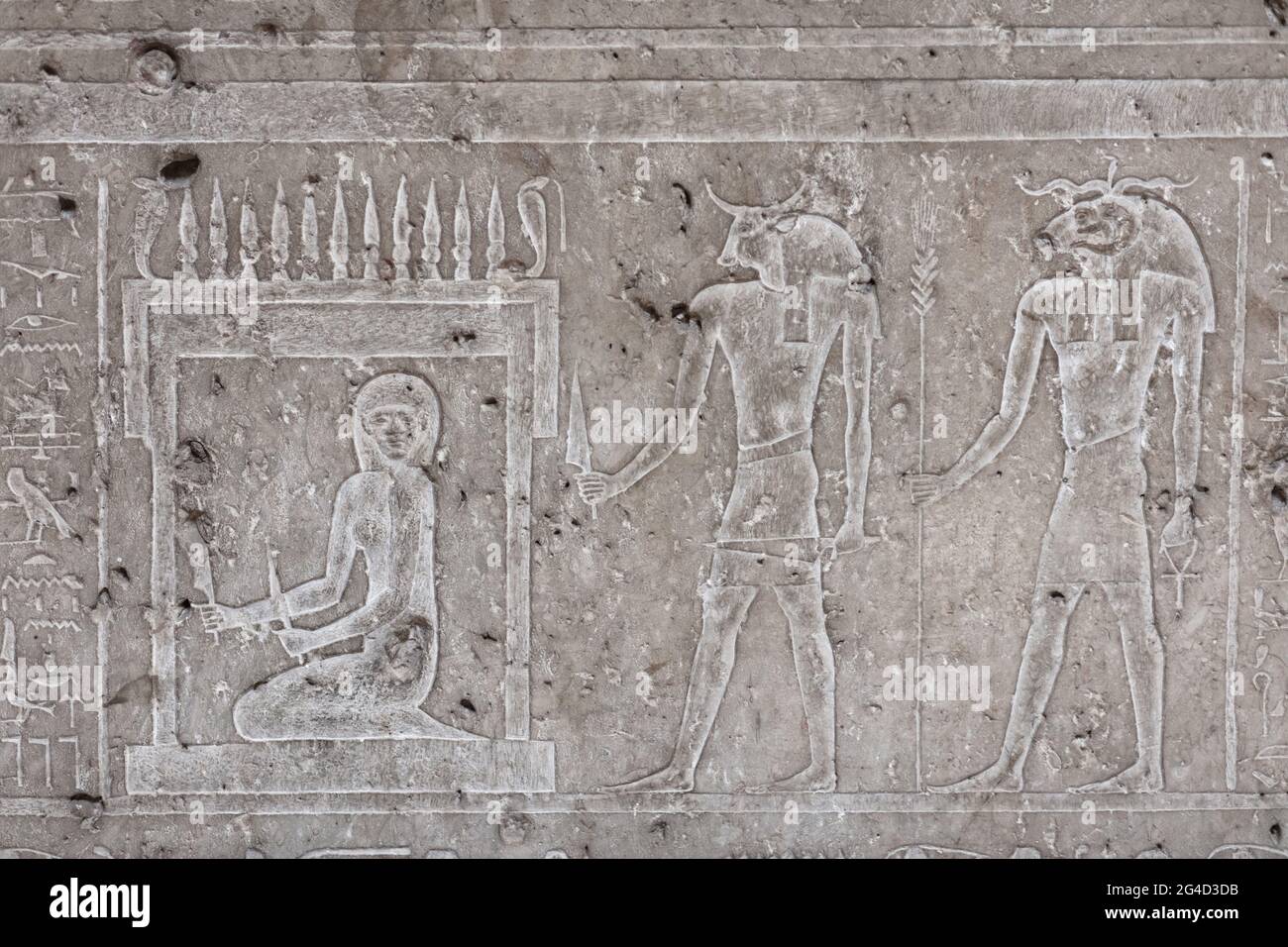 Ancient engraved drawing on the grey tomb wall Stock Photo - Alamy