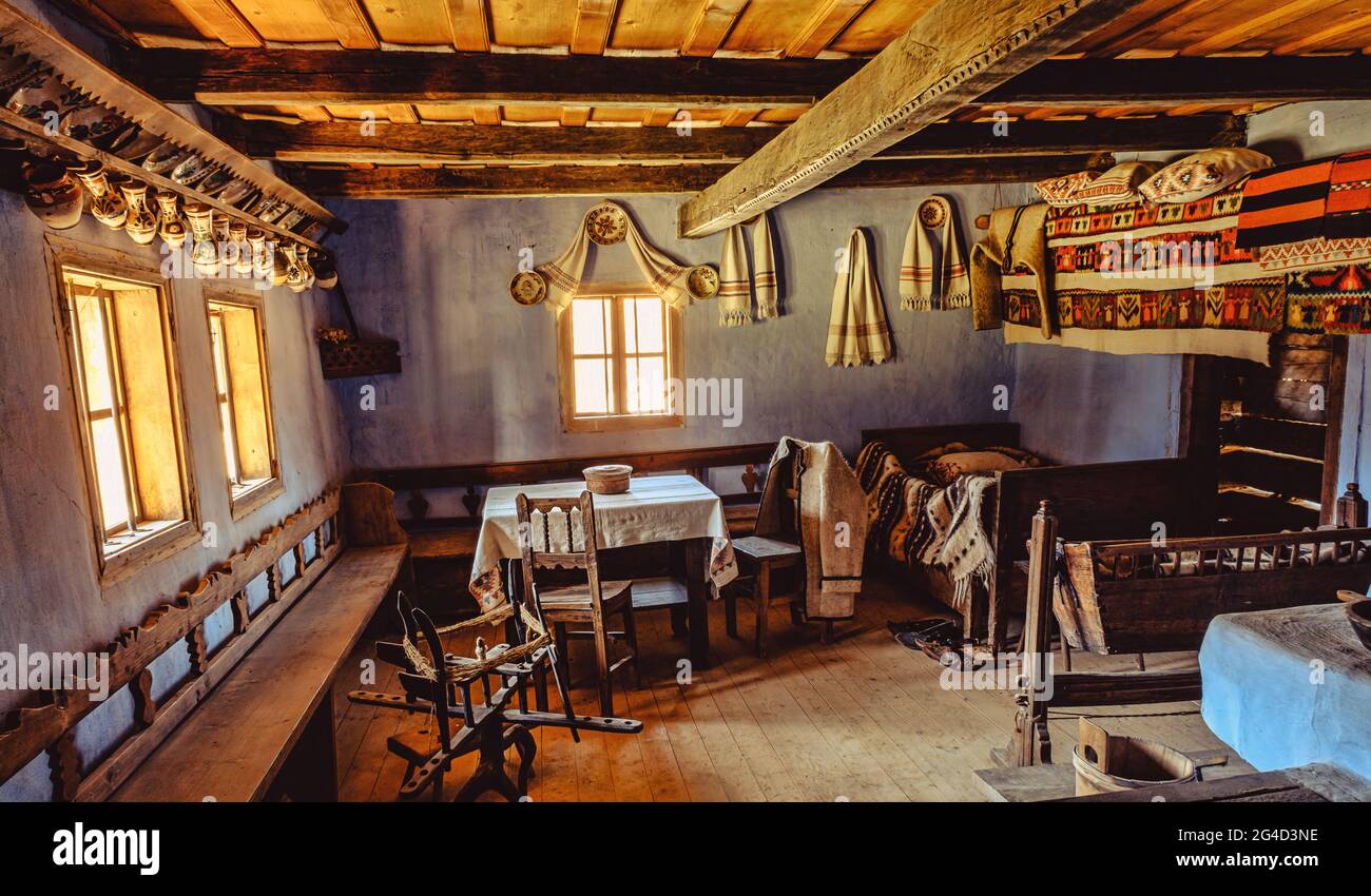 Traditional Romanian folk house interior with rural furniture and ...