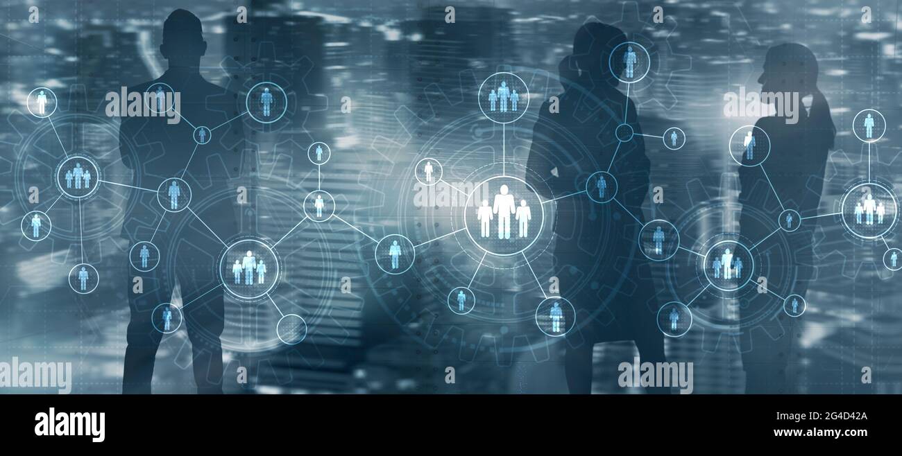 Teamwork. Gears on the background of a modern office building and ...