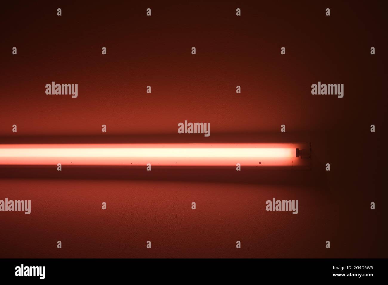 red neon bar on a wall Stock Photo - Alamy