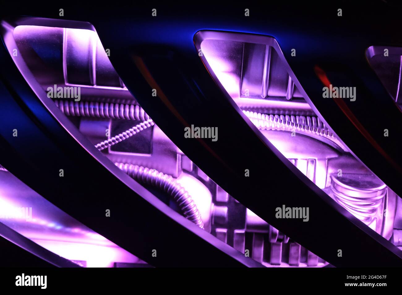 Machine interior with purple light Stock Photo - Alamy