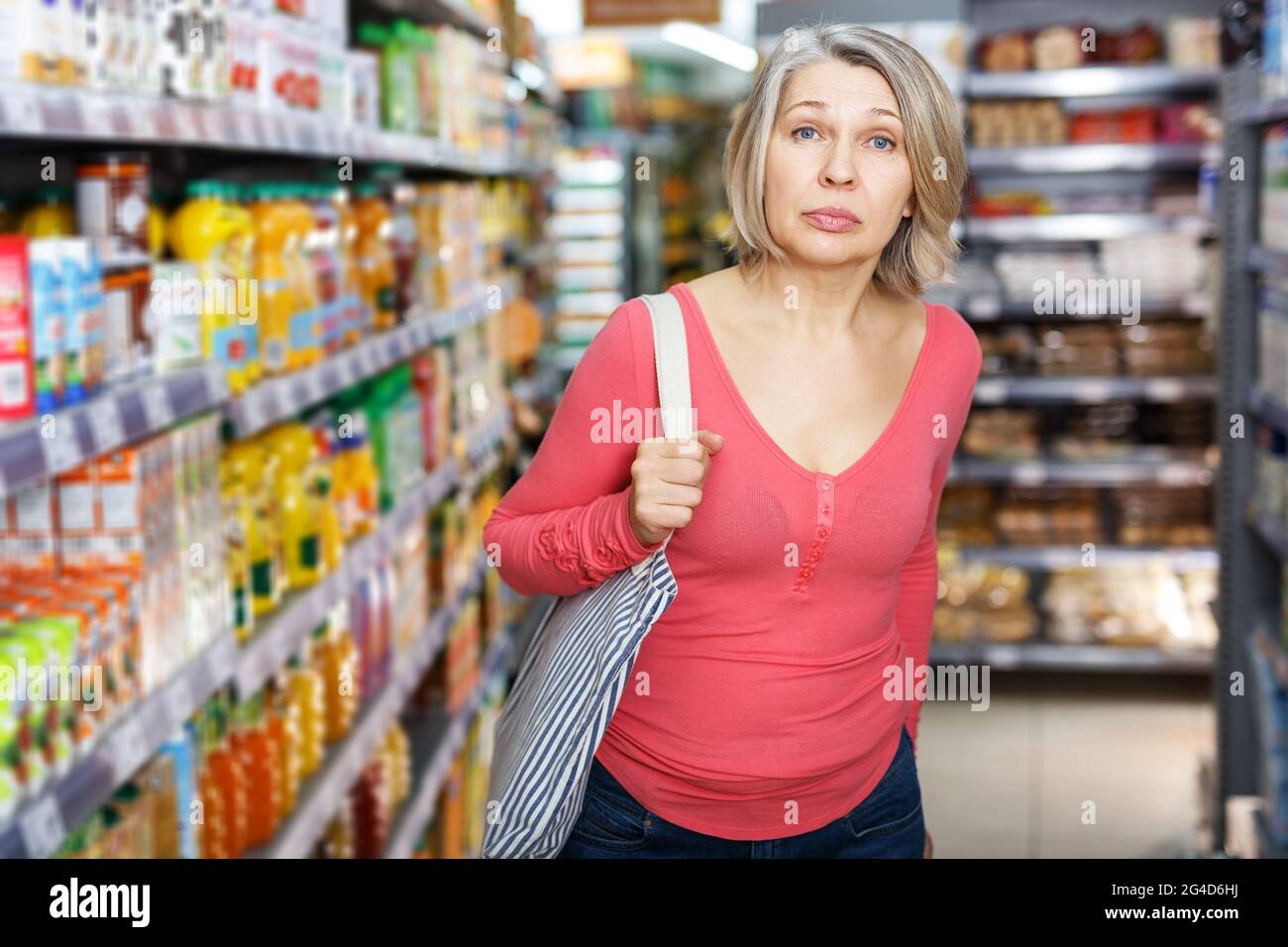 woman visiting supermarket food department Stock Photo - Alamy