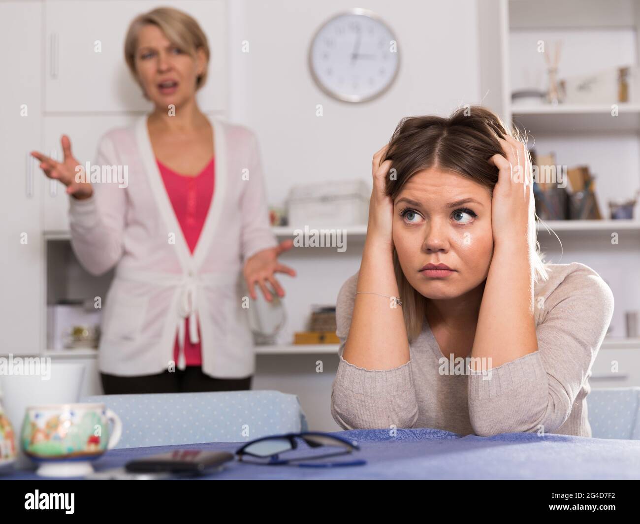 Mother scolds her adult daughter Stock Photo - Alamy