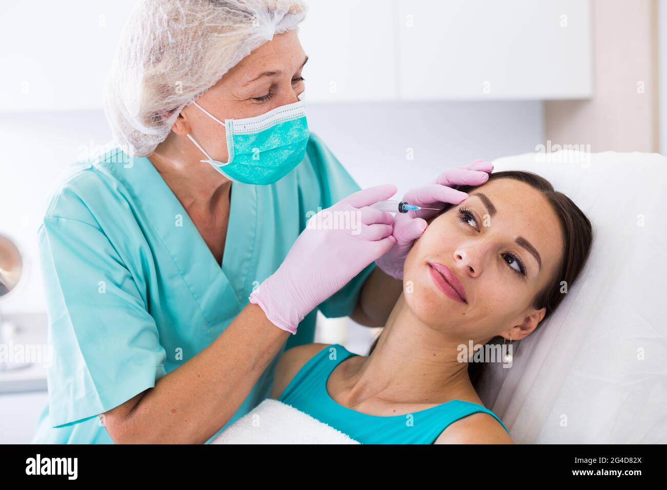 Female receiving cosmetic injection Stock Photo - Alamy