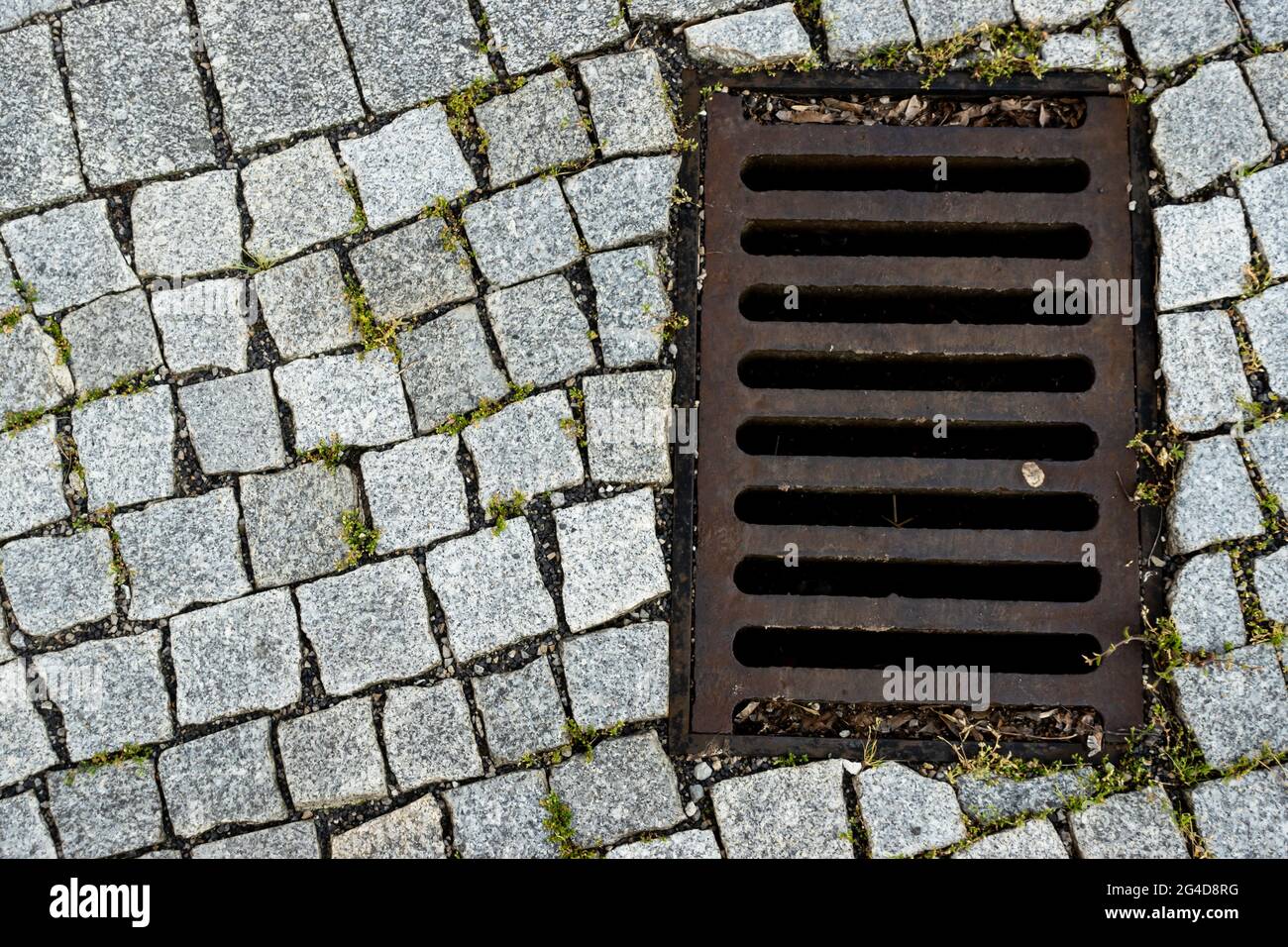 Cast iron storm drain grate hi-res stock photography and images - Alamy
