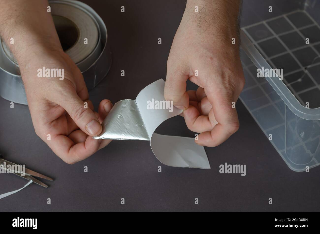 Peeling off backing paper hi-res stock photography and images - Alamy