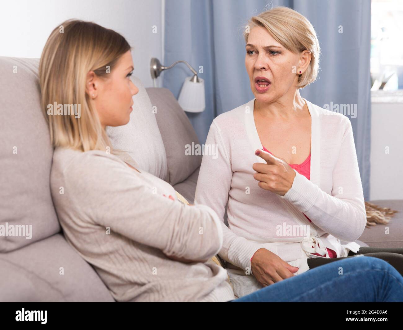 mother scolds her adult daughter Stock Photo - Alamy
