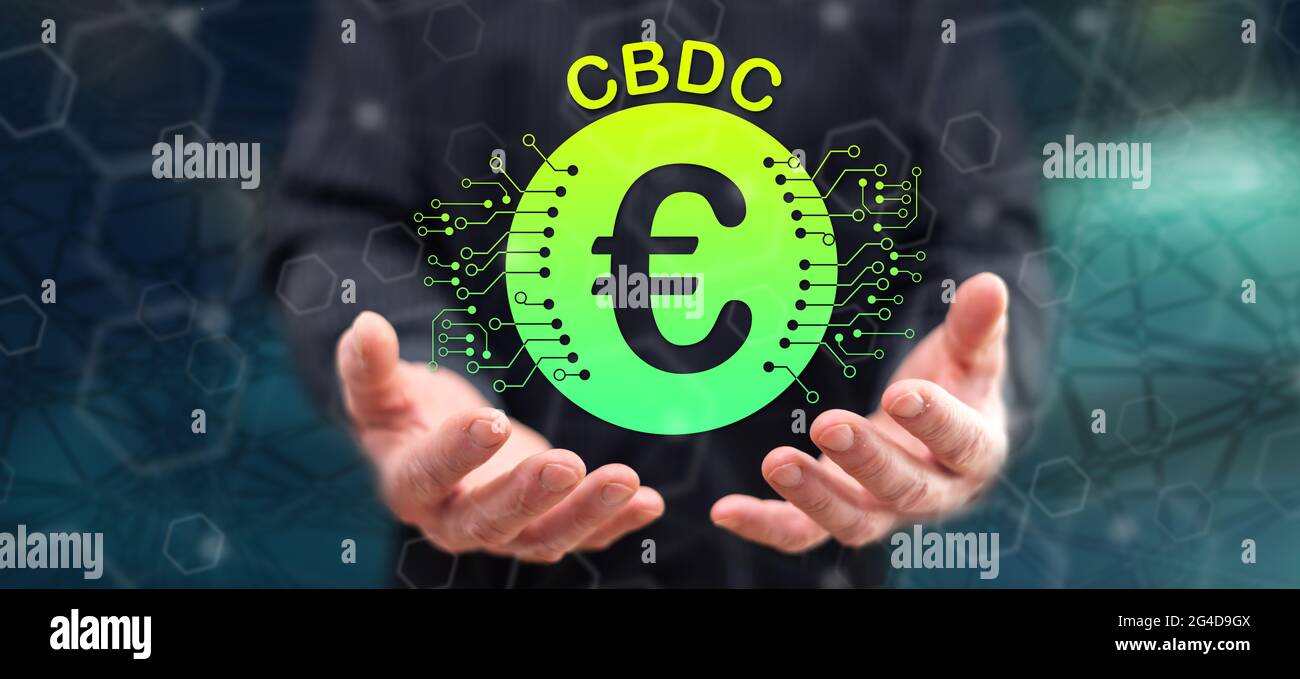 Cbdc concept above the hands of a man in background Stock Photo - Alamy