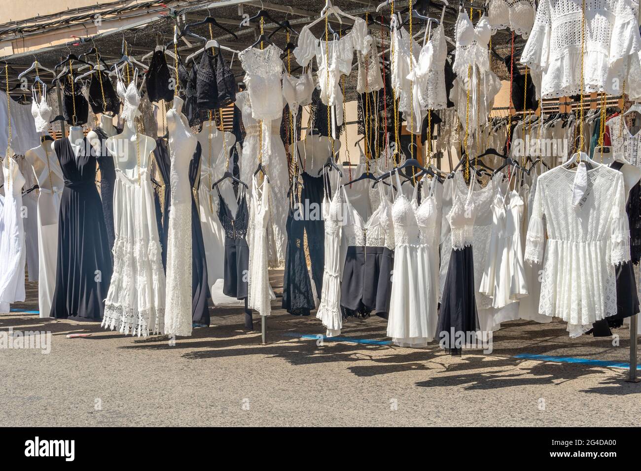 Ibizan style linen stall at the weekly street market in the Majorcan ...
