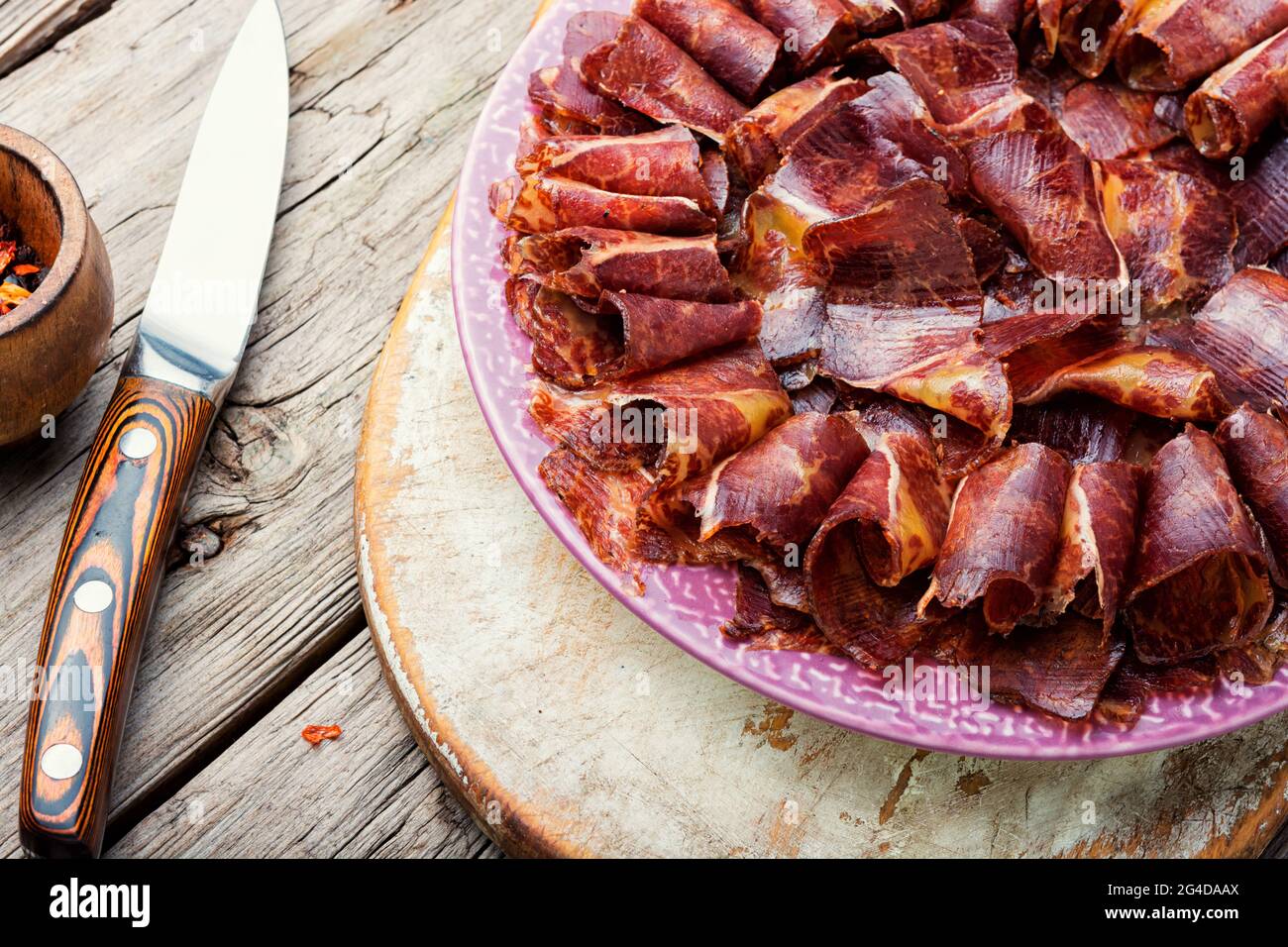 Sliced basturma or beef jerky.Horse meat jerky.Armenian cuisine Stock ...