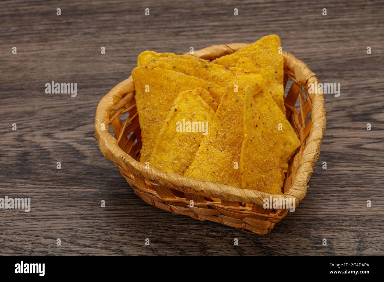 Mexican crunchy corn nachos triangle heap Stock Photo - Alamy
