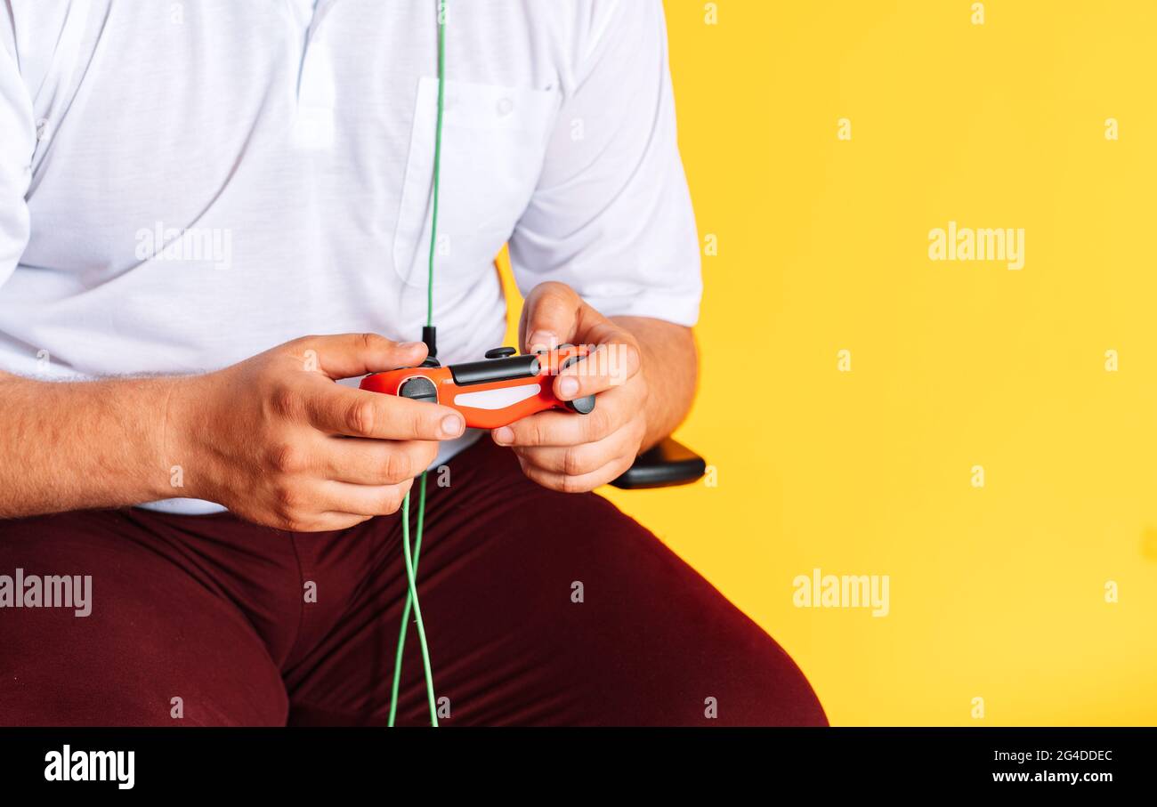 Guy holding game controller hi-res stock photography and images - Alamy