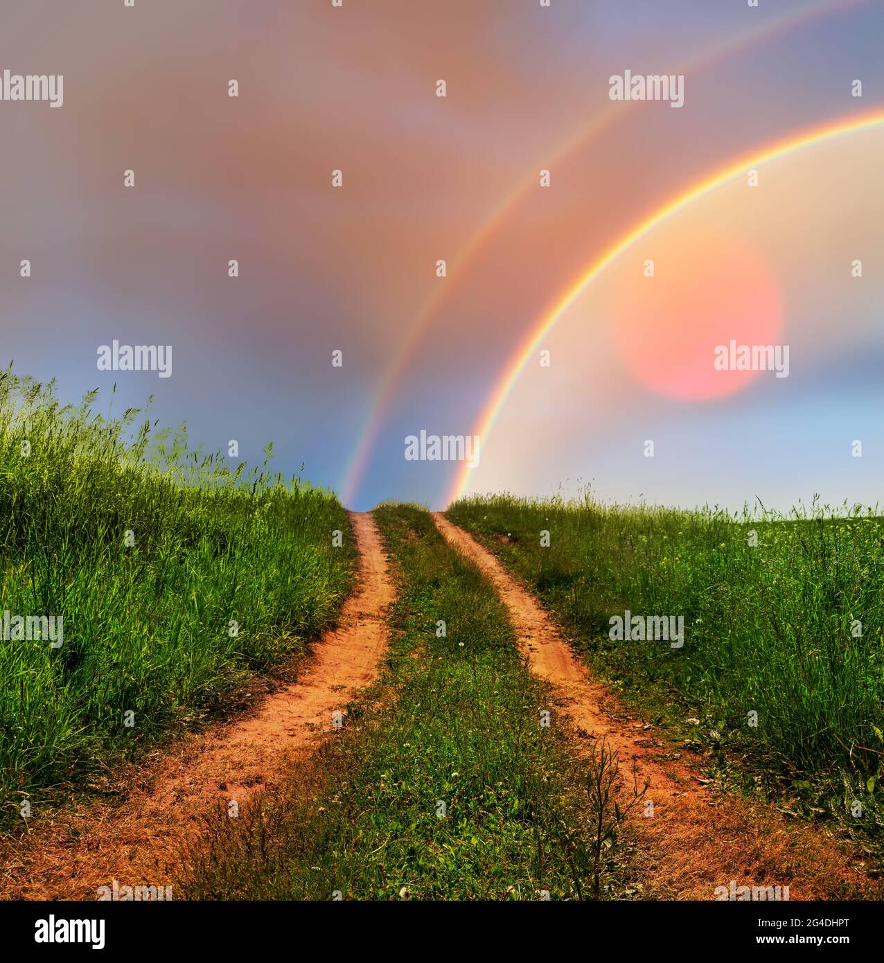 concept of the road to heaven through the rainbow. the country road ...