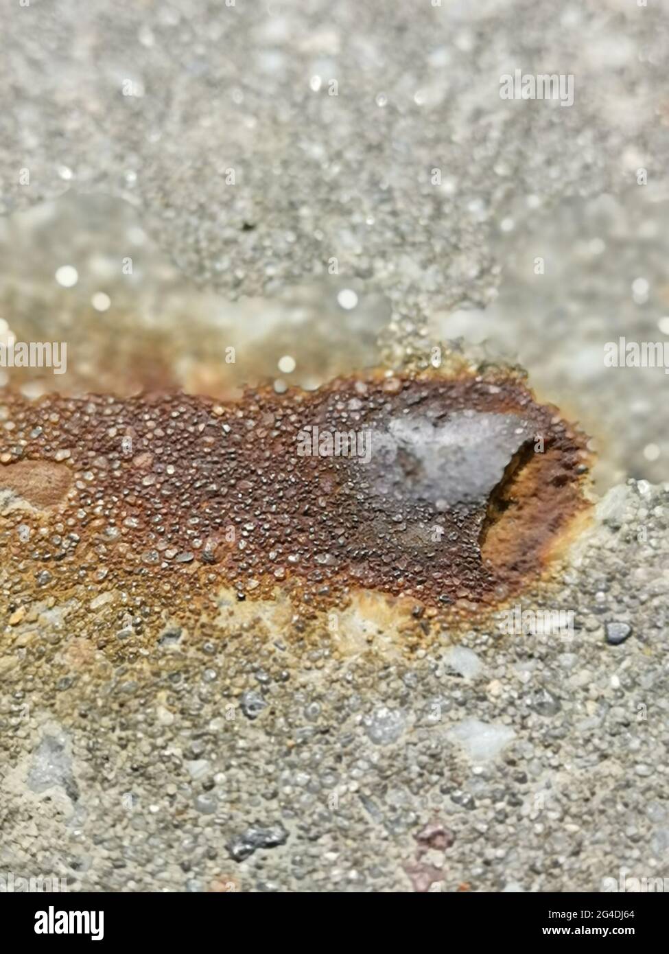 Rust on the concrete surface Stock Photo - Alamy