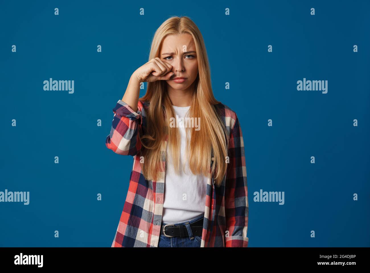 Young blonde woman crying hi-res stock photography and images - Alamy