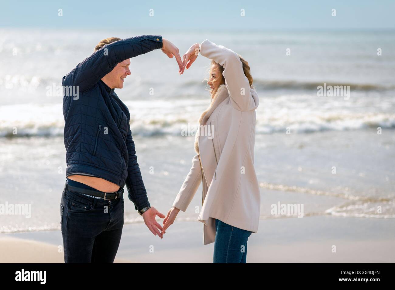 Girl making heart shape arms High Resolution Stock Photography and ...