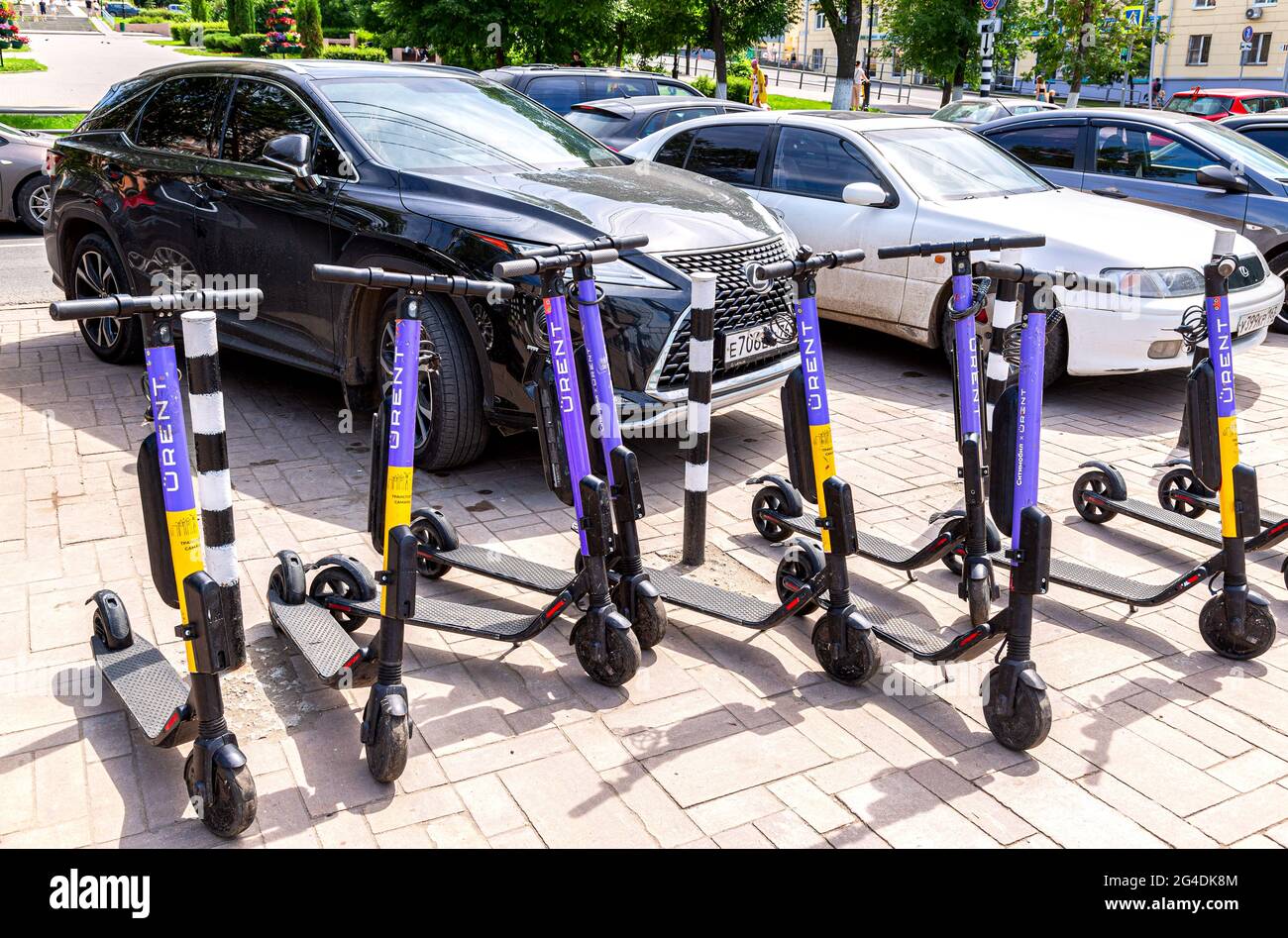 Samara, Russia - June 14, 2021: Cars and electric scooters for rental ...