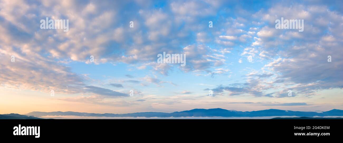 fluffy clouds on the azure sky at sunrise. beautiful nature background ...