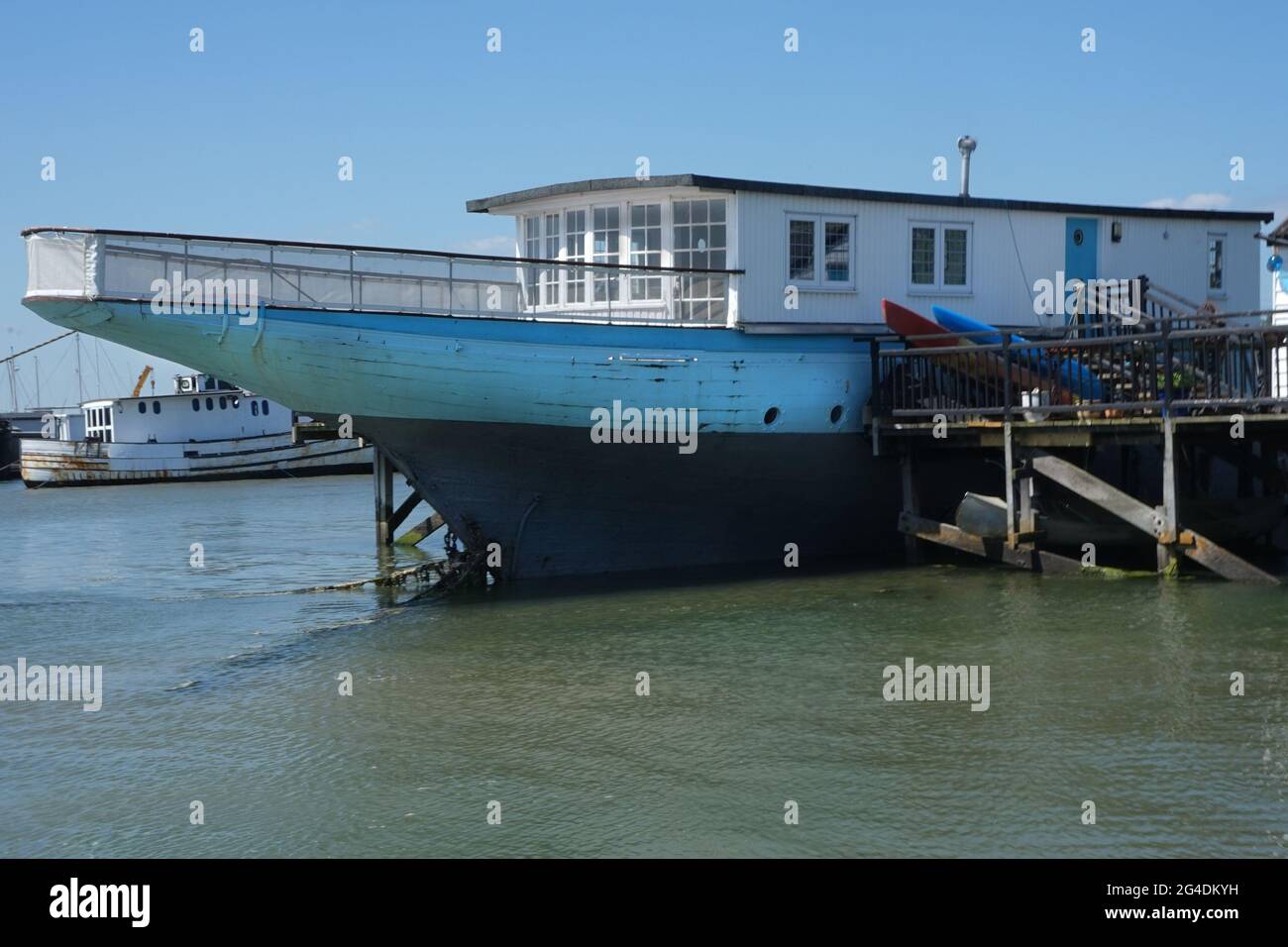 Old Sailing boat converted into a House Boat Stock Photo - Alamy