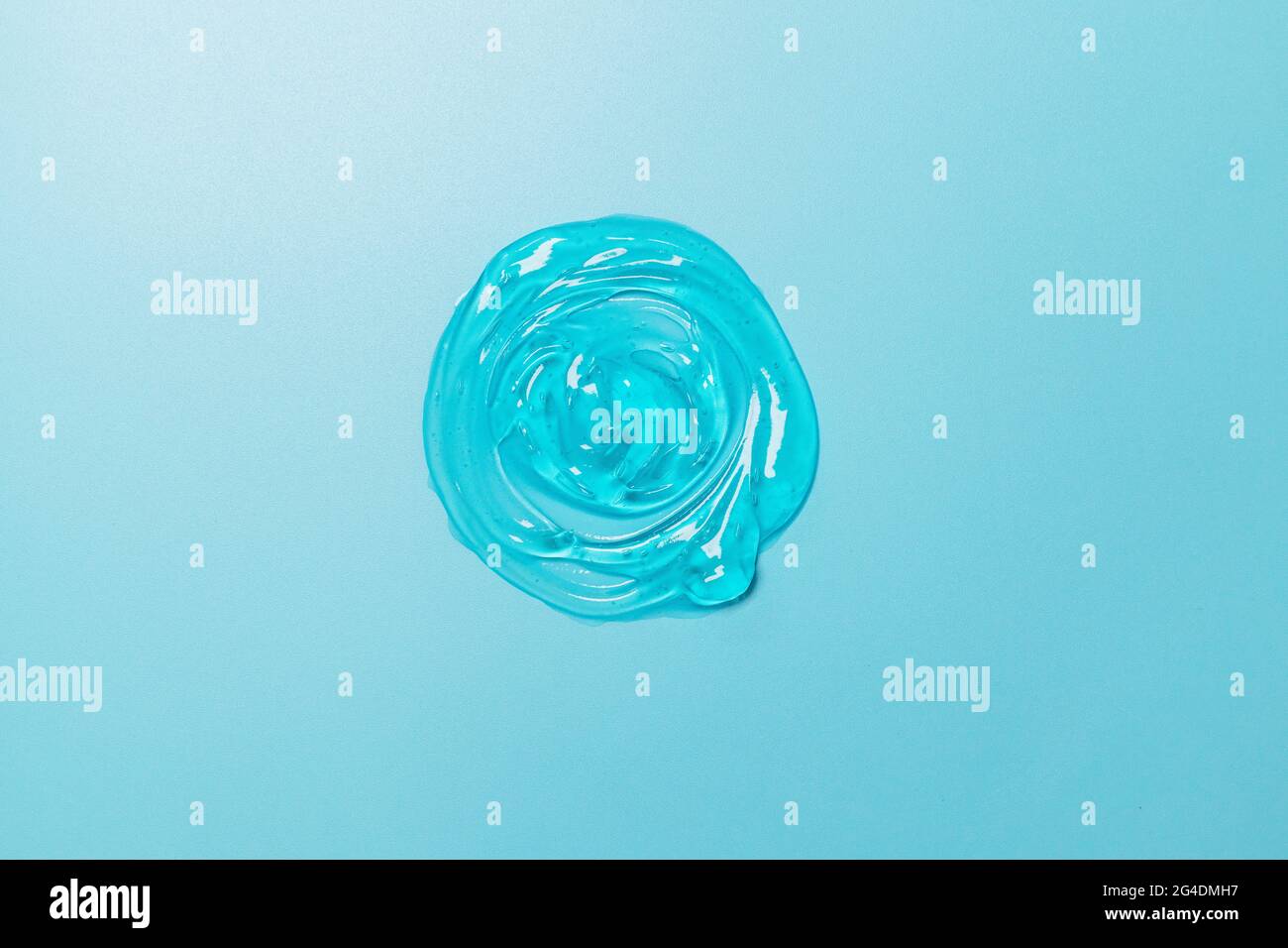 Liquid gel cosmetic drops texture blue grey background Stock Photo - Alamy
