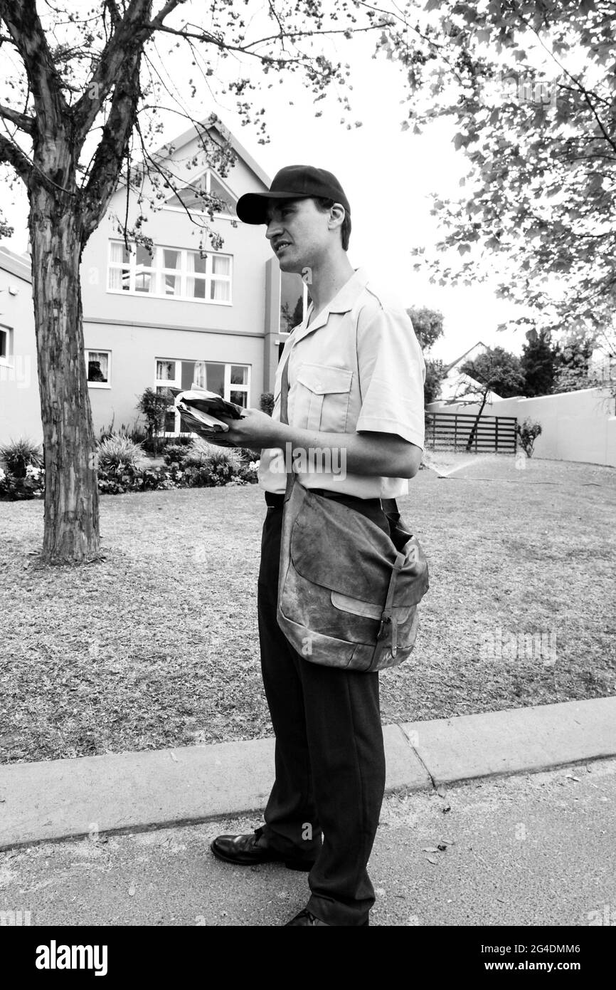Postman in traditional uniform Black and White Stock Photos & Images ...