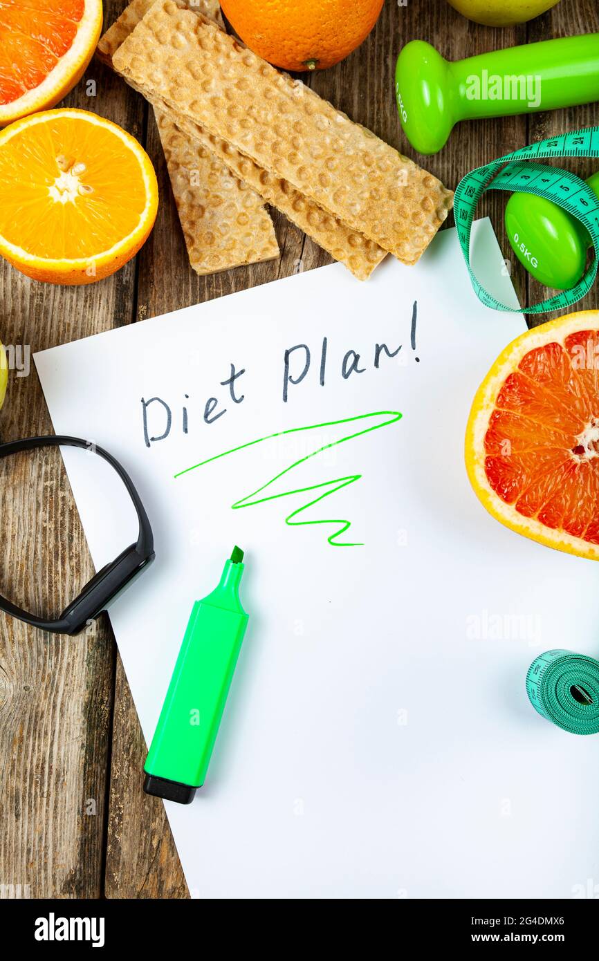 Diet plan sheet on the table. Weight loss and healthy eating Stock ...