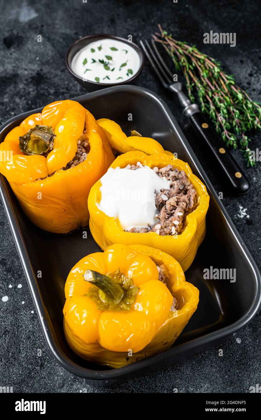 Baked yellow Sweet bell pepper stuffed with beef meat, rice and ...
