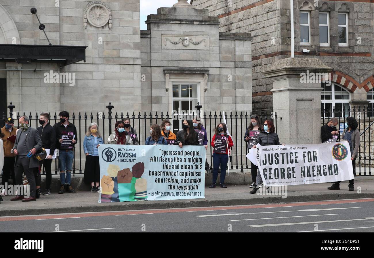 Protesters outside the RDS in Dublin as the inquest opens for George ...