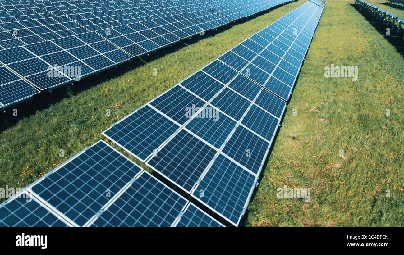 Aerial view of Solar Panels Farm solar cell with sunlight. Drone flight ...