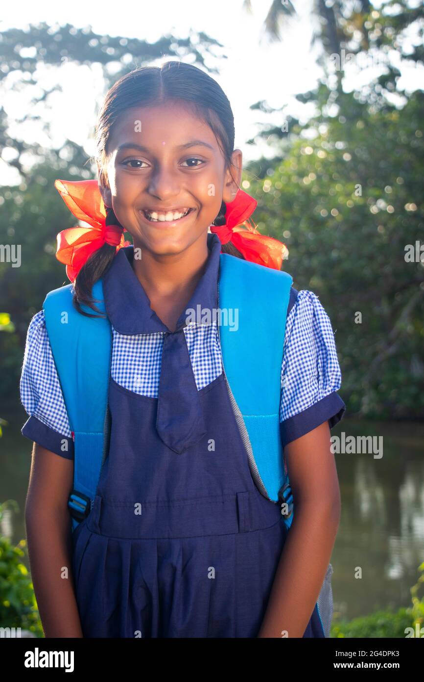 Smiling indian Rural School Girl Looking at camera Stock Photo - Alamy