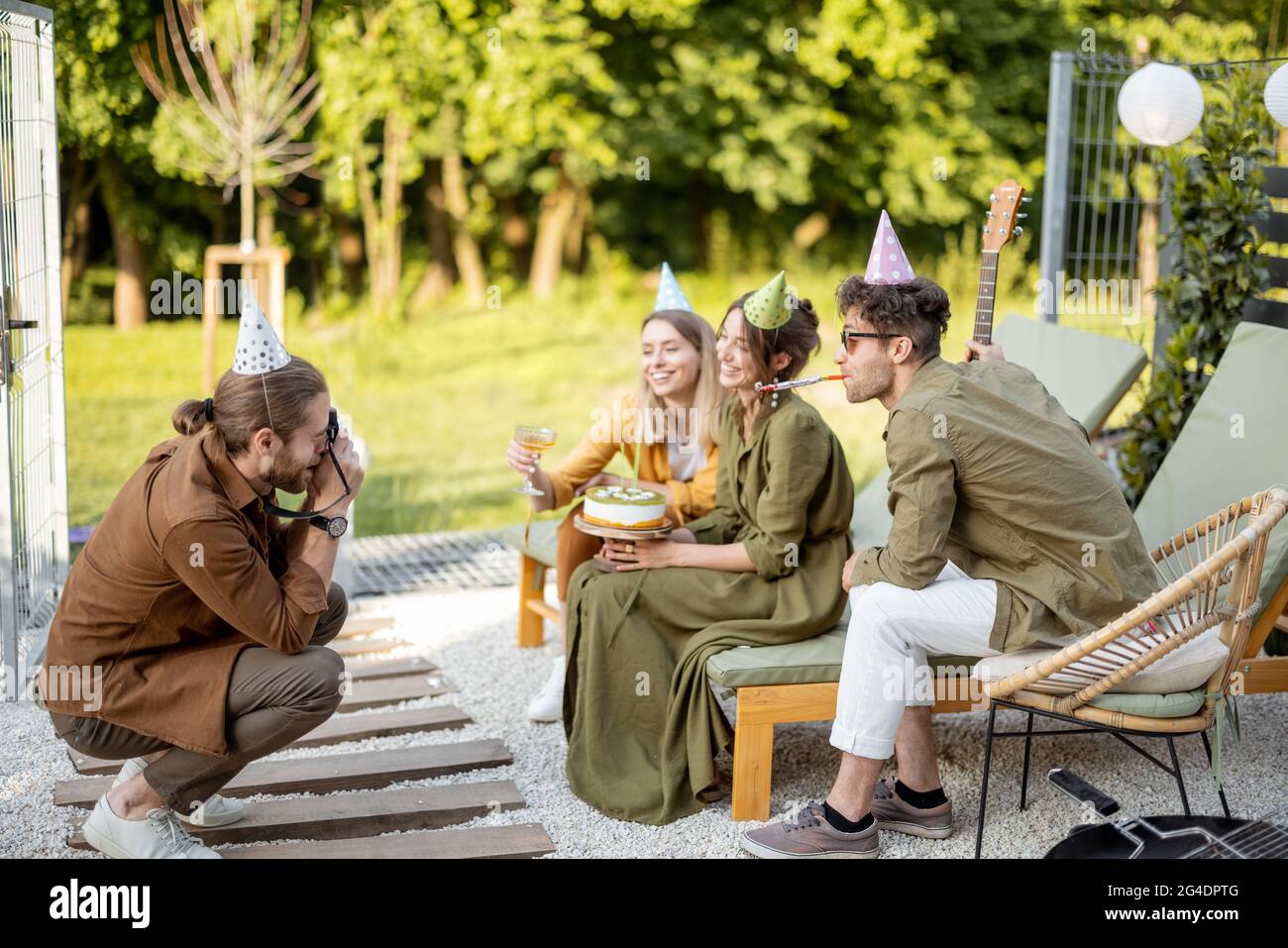 Friends having fun celebrating birthday party outdoors Stock Photo - Alamy