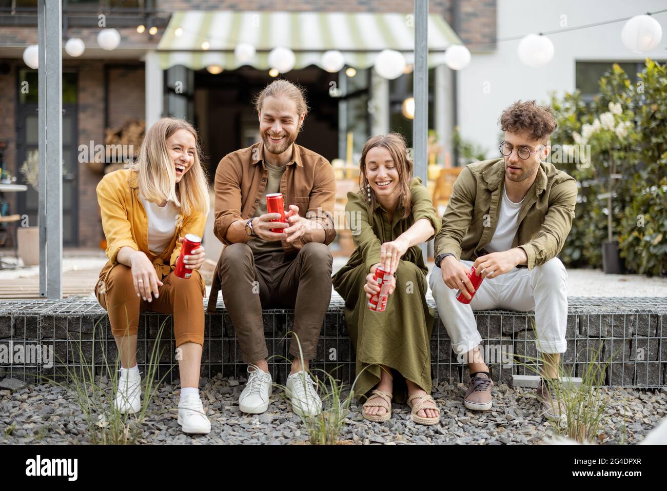 Friends sitting on a porch hi-res stock photography and images - Alamy