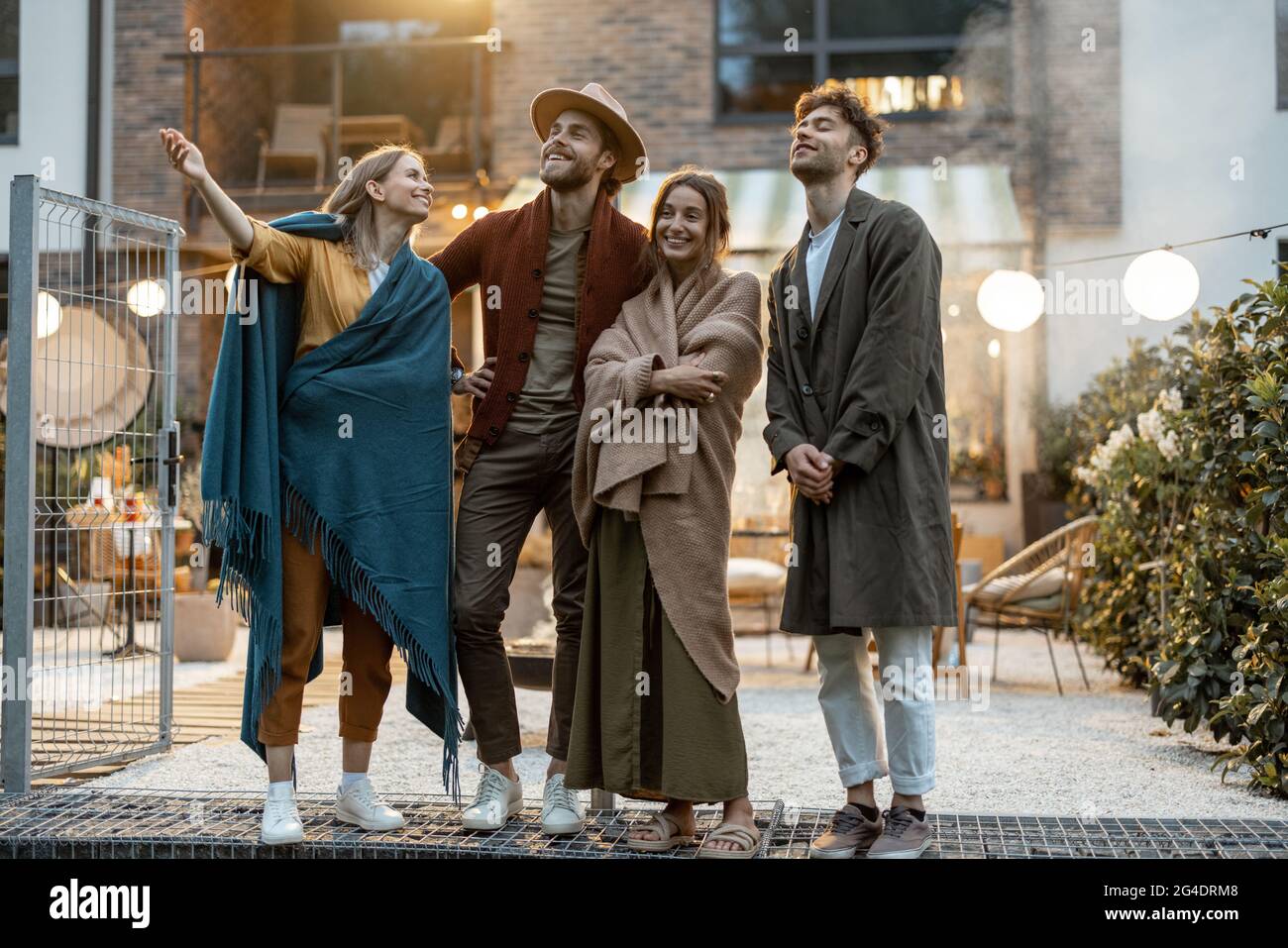 Group on house porch hi-res stock photography and images - Alamy