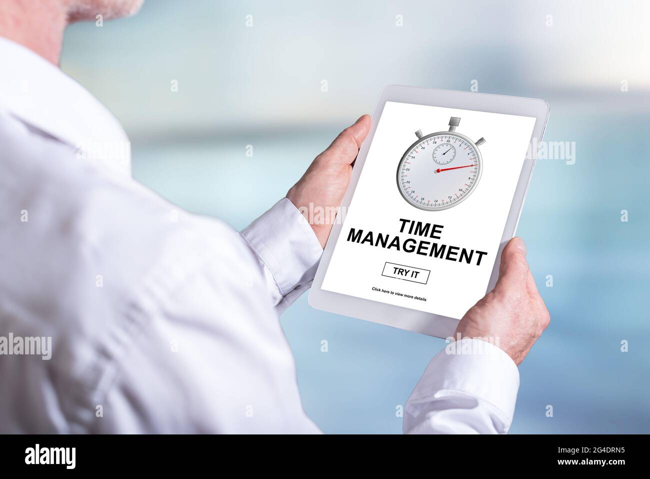 Tablet screen displaying a time management concept Stock Photo - Alamy