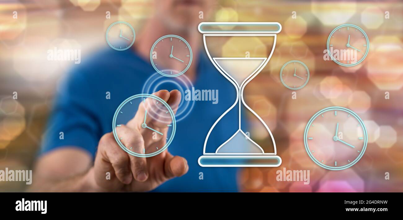 Man touching a time management concept on a touch screen with his ...